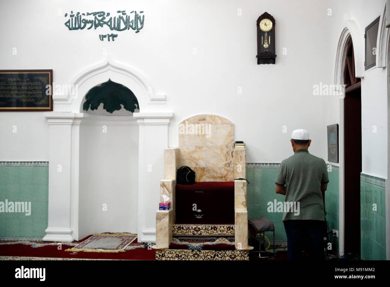 Al noor mosque. Muslim man praying alone. Hanoi. Vietnam Stock Photo ...