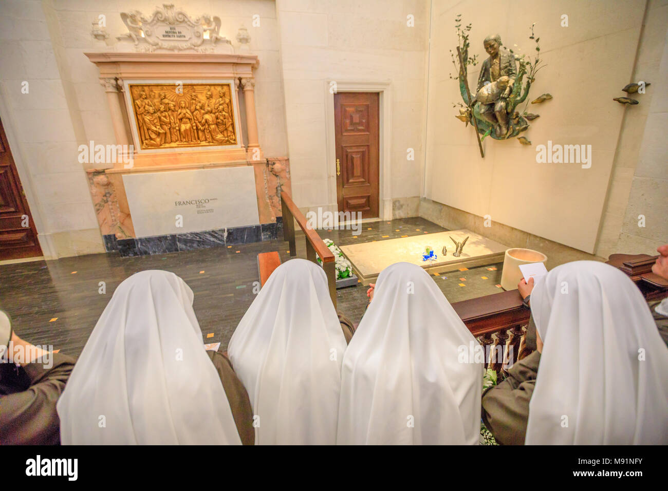 Fatima, Portugal - August 15, 2017: nuns pray before one of graves of ...