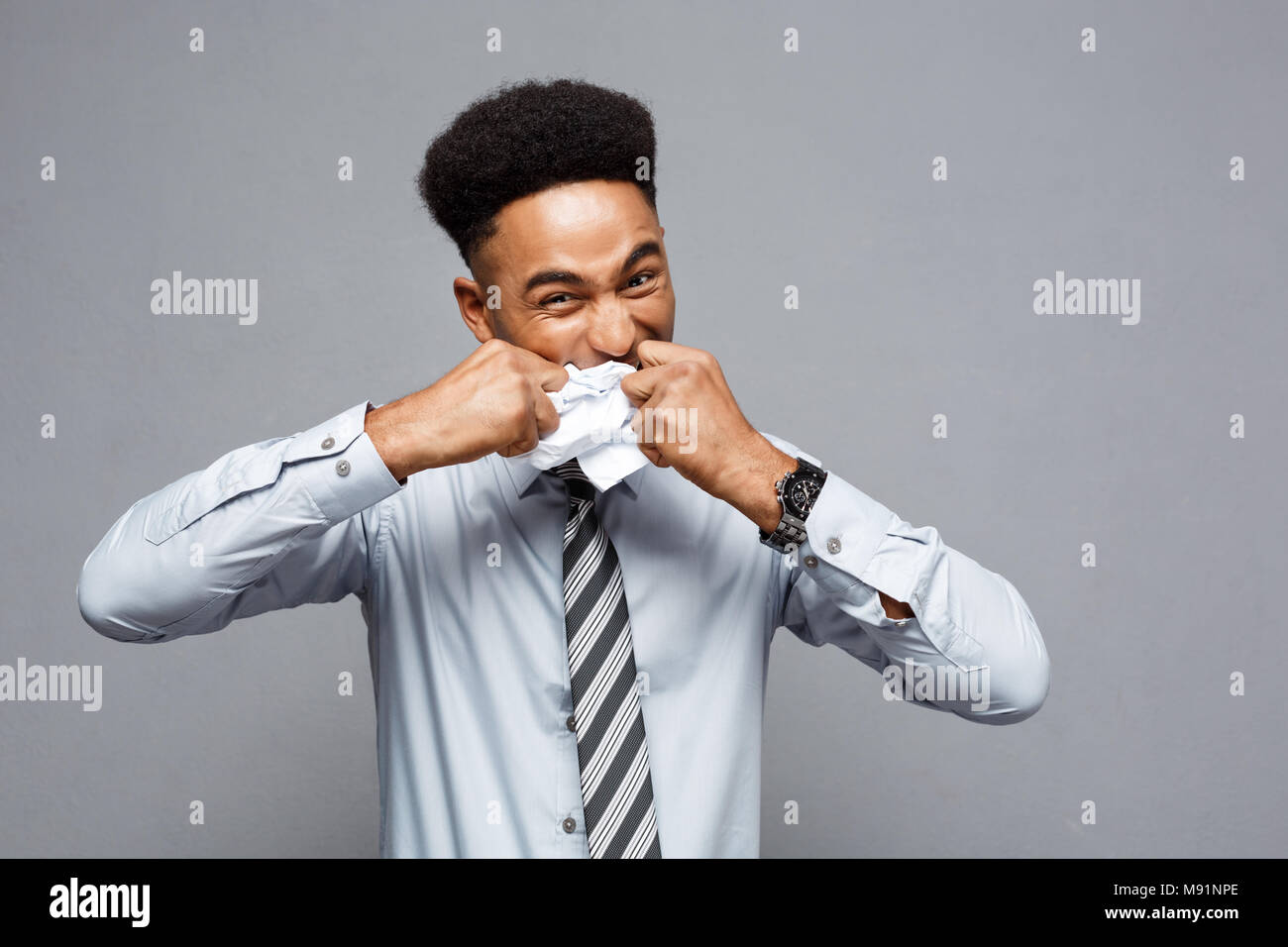 Business Concept - Young angry African American businessman while ...