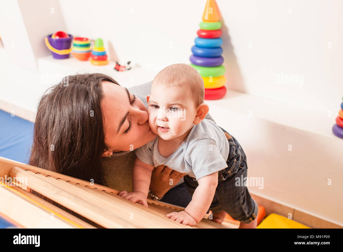 Interaction between mother and baby Stock Photo - Alamy