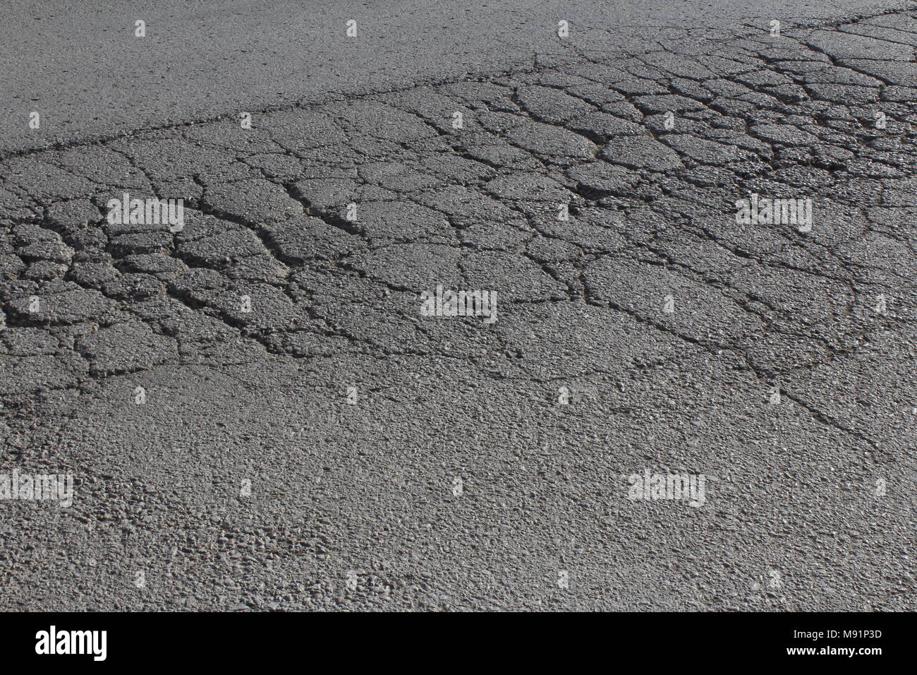 Broken asphalt hi-res stock photography and images - Alamy