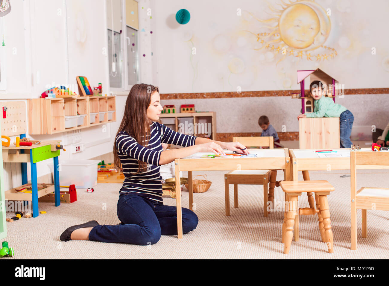 Kindergarten worker hi-res stock photography and images - Alamy
