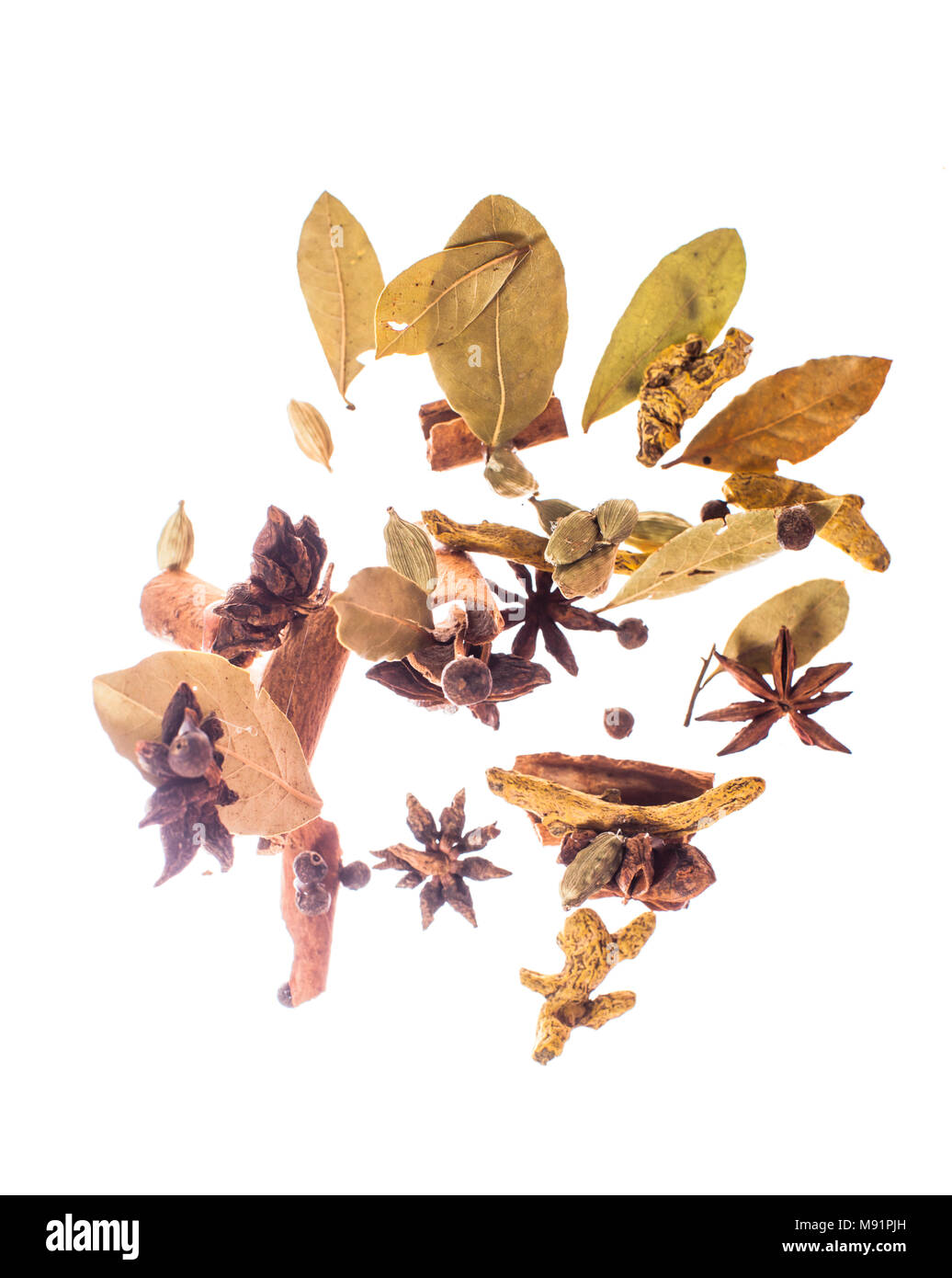 Flying spices isolated Stock Photo - Alamy
