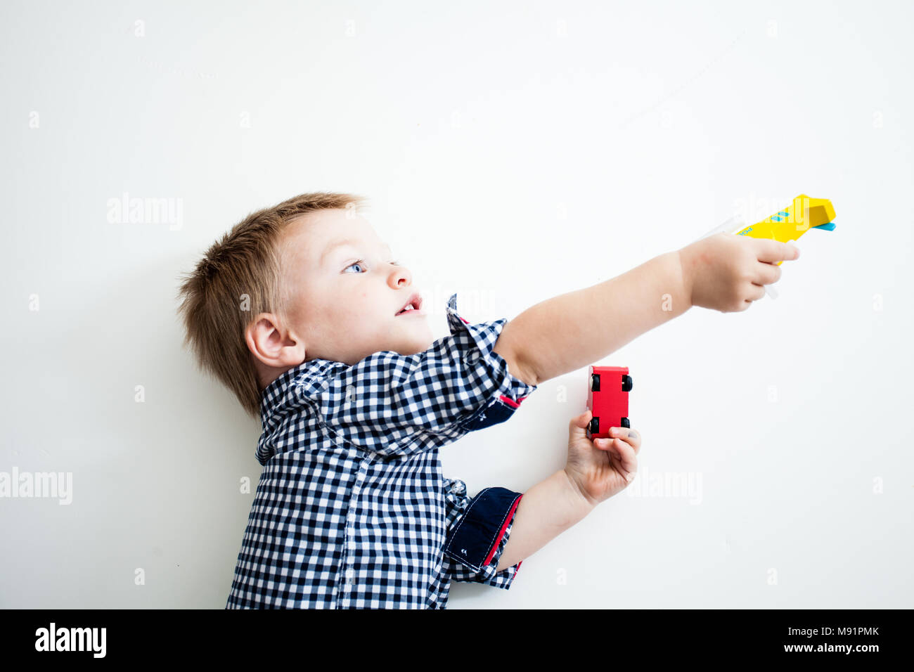 The boy playing Stock Photo - Alamy