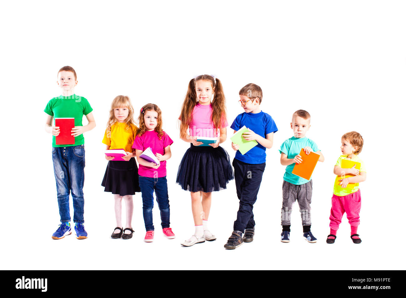 Smart children with books Stock Photo - Alamy