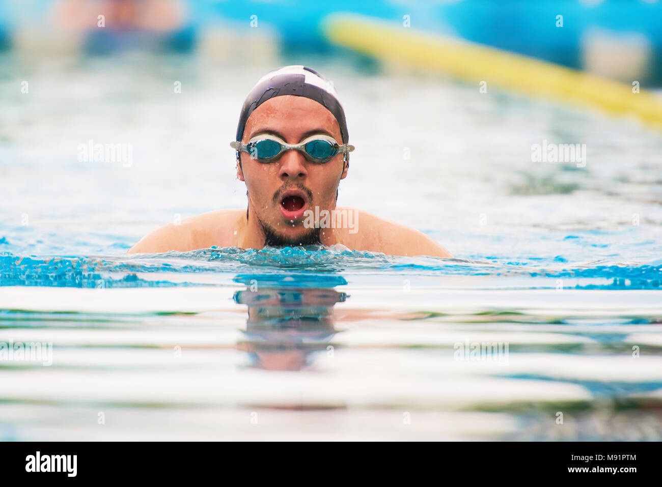 Portrait of young man swim in pool. Active lifestyle exercise Stock ...