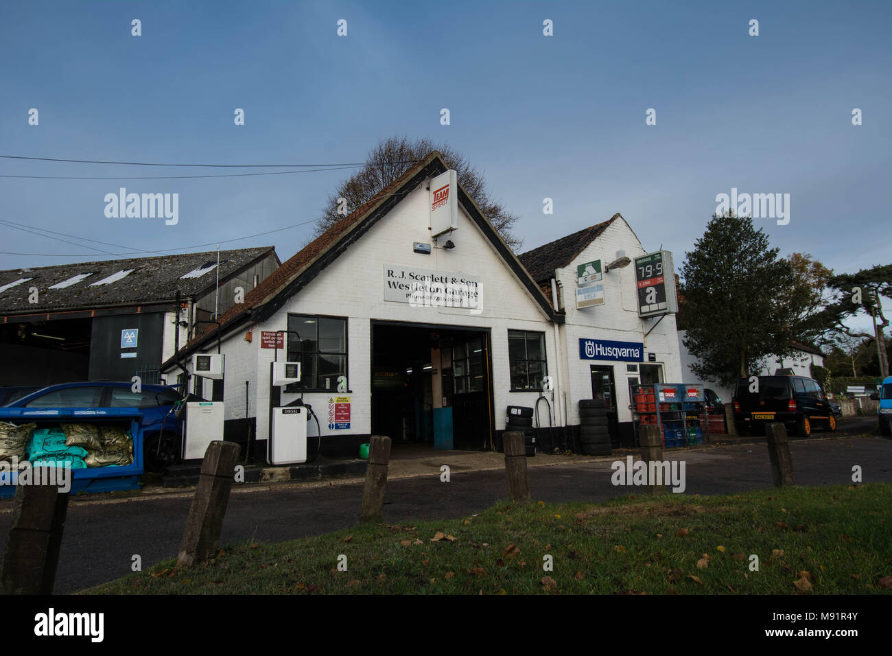old style Garage and petrol pumps petrol bollards wood wooden mending ...