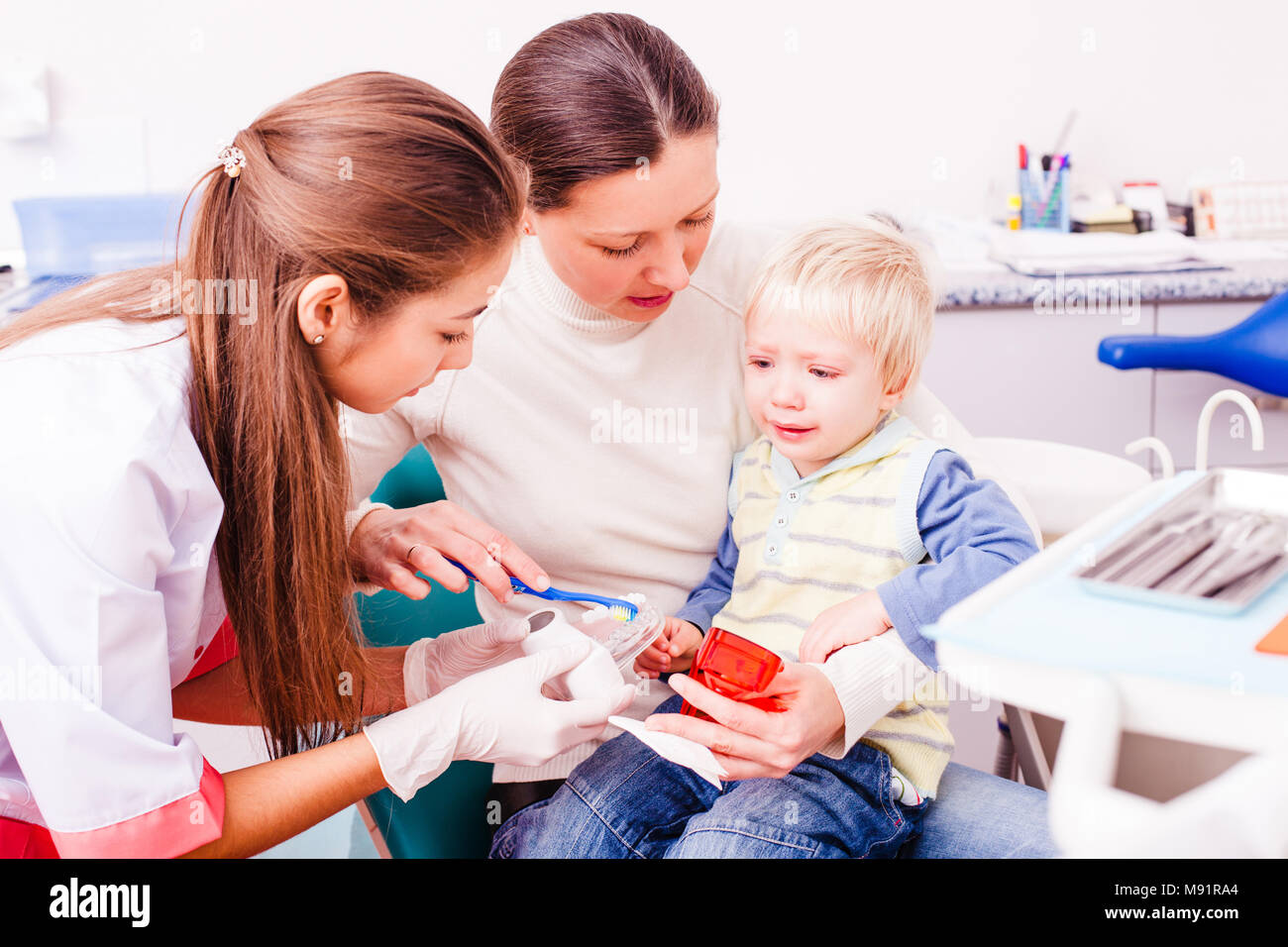 Visiting a dentist Stock Photo - Alamy