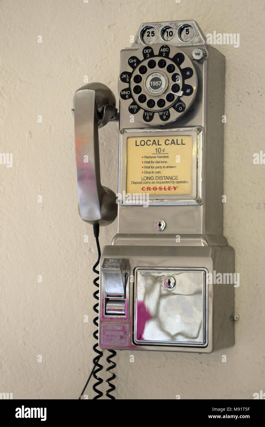 Old public telephone at the wall hi-res stock photography and images ...