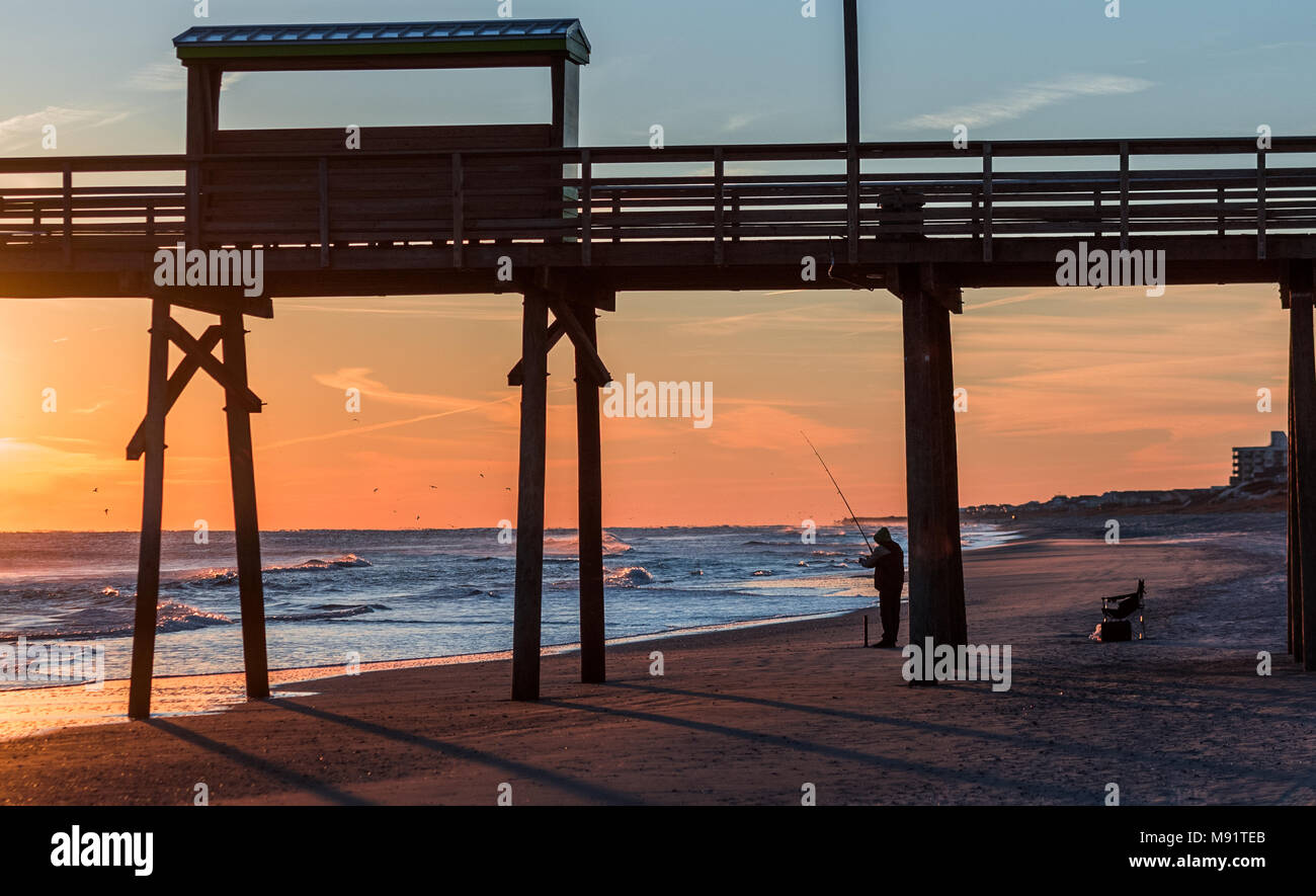 Sunset at the north carolina beach with atlantic beach pier and sunrise ...