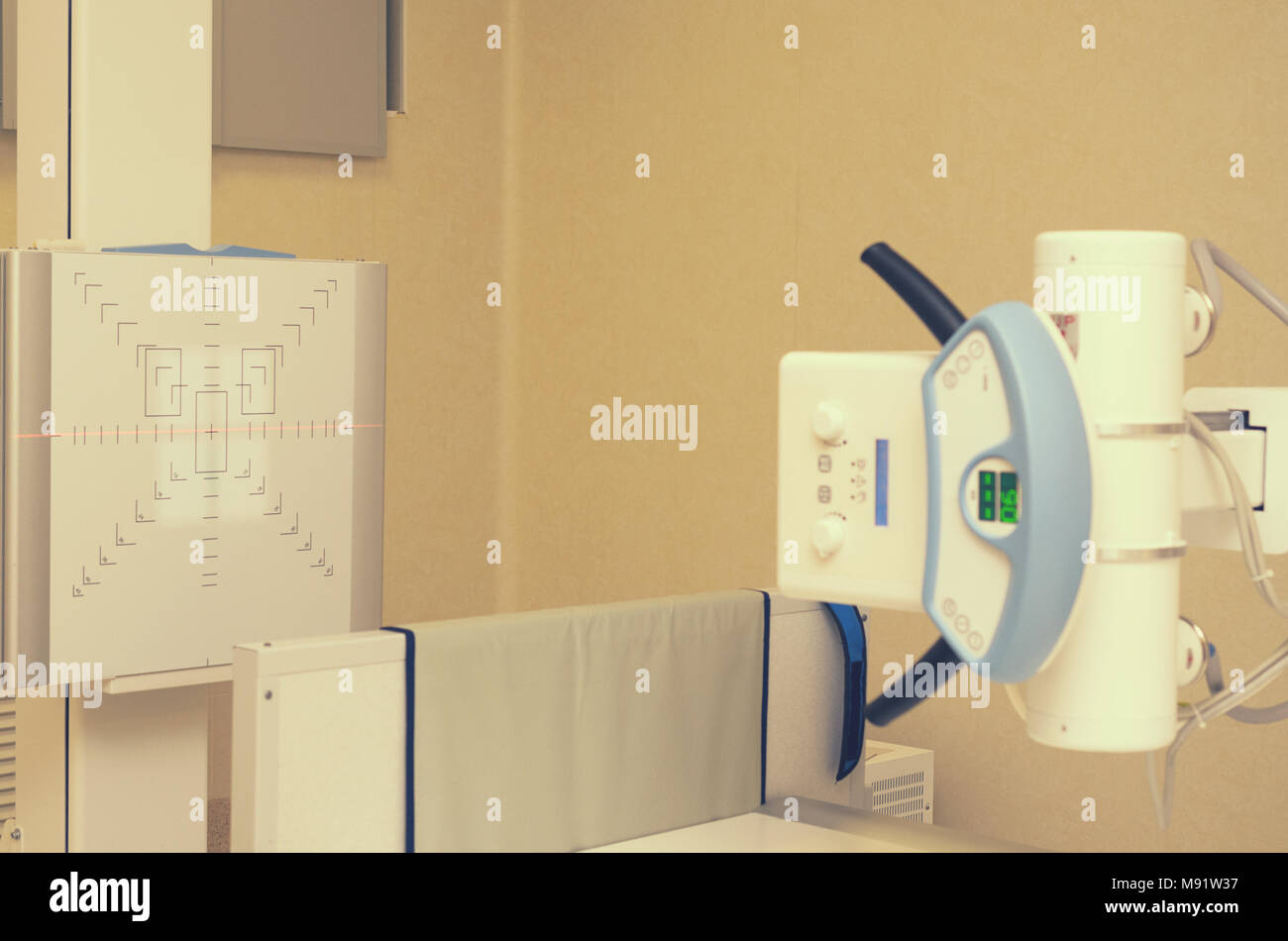Room with an X-ray apparatus table for the production of X-ray images ...