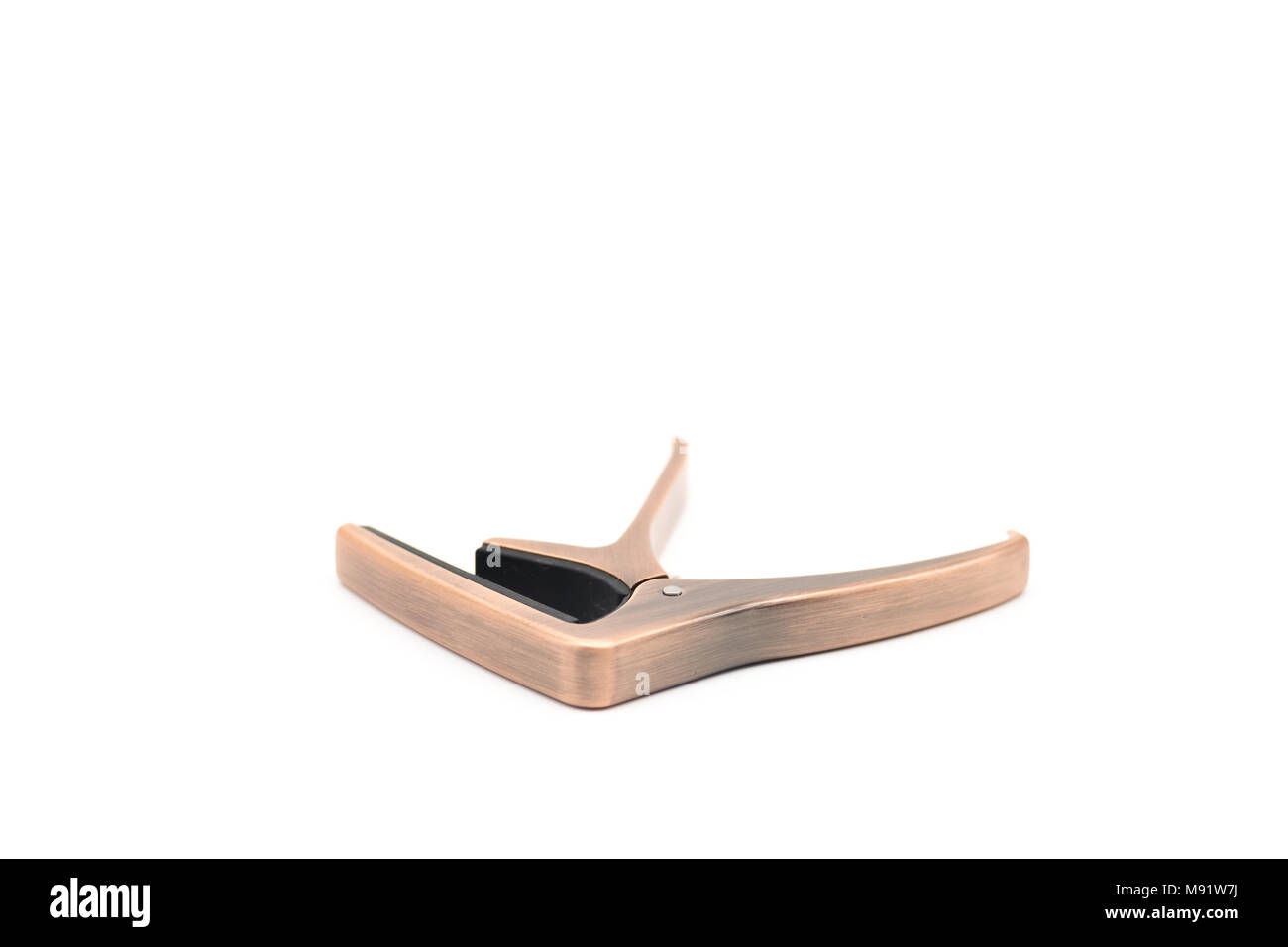 Metal Guitar Capo isolated on white background Stock Photo - Alamy