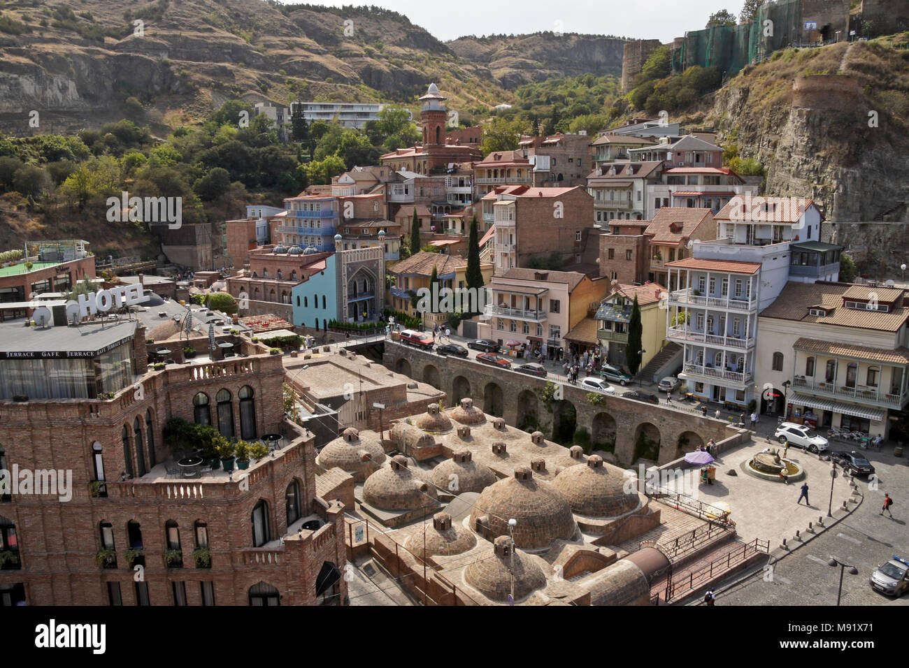 The Abanotubani, Orbeliani Baths, red-brick minaret of a mosque ...