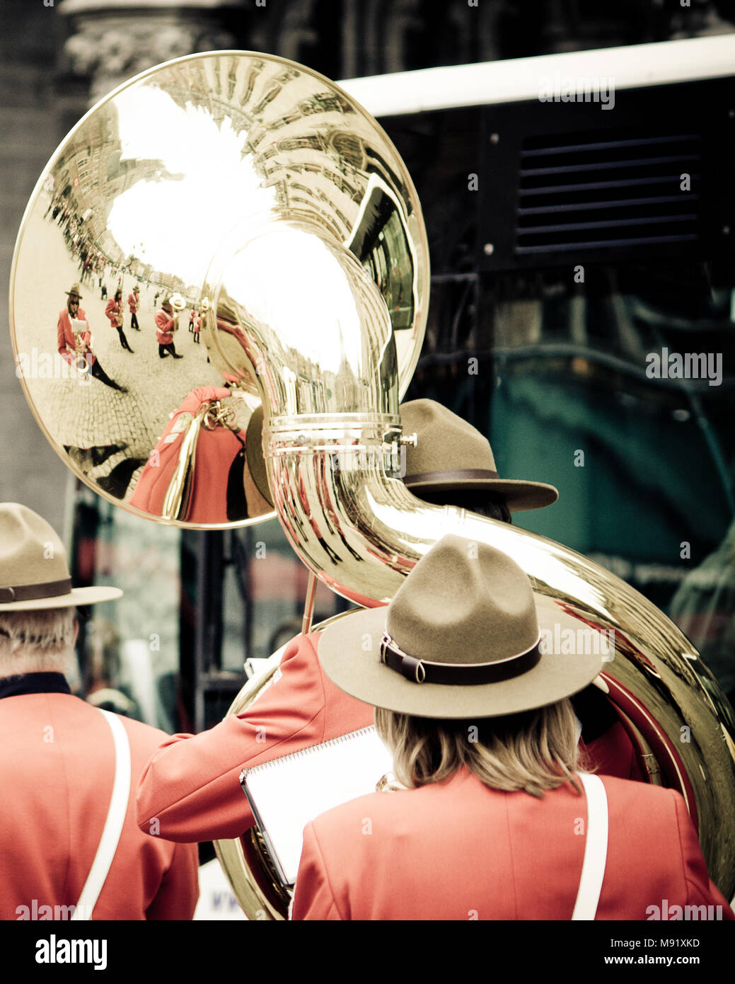 Woman playing her golden bright tuba in the street Stock Photo - Alamy