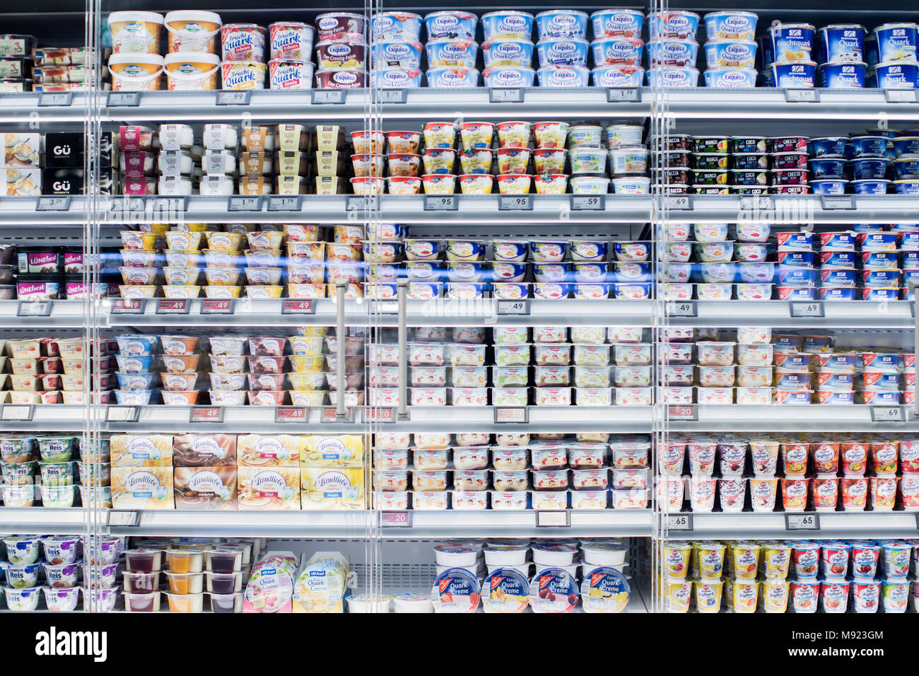 21 March 2018, Germany, Duesseldorf: Yoghurts are stacked in a ...