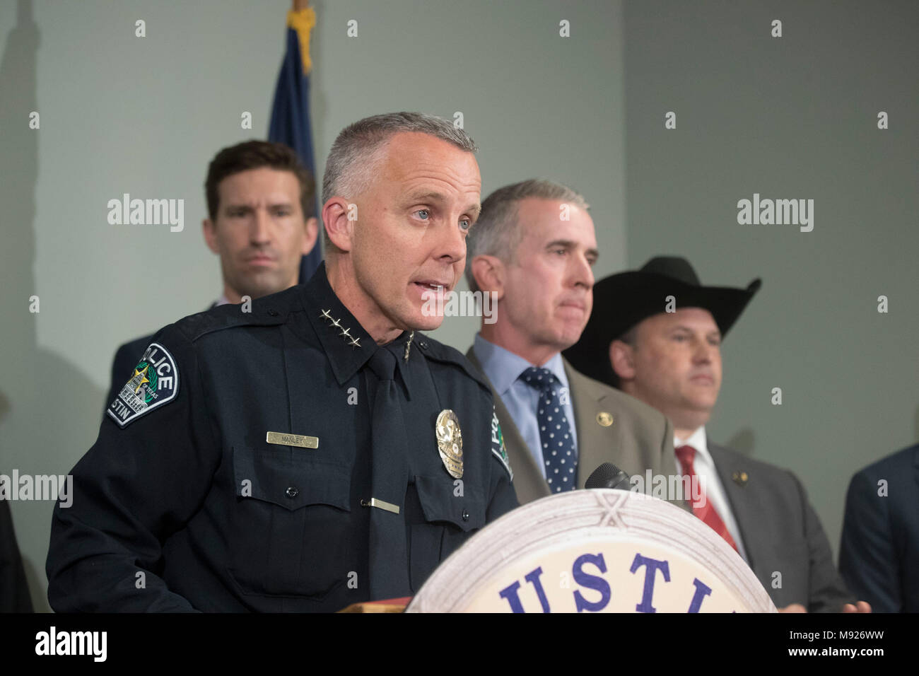 Austin interim Police Chief Brian Manley leads a congratulatory press ...