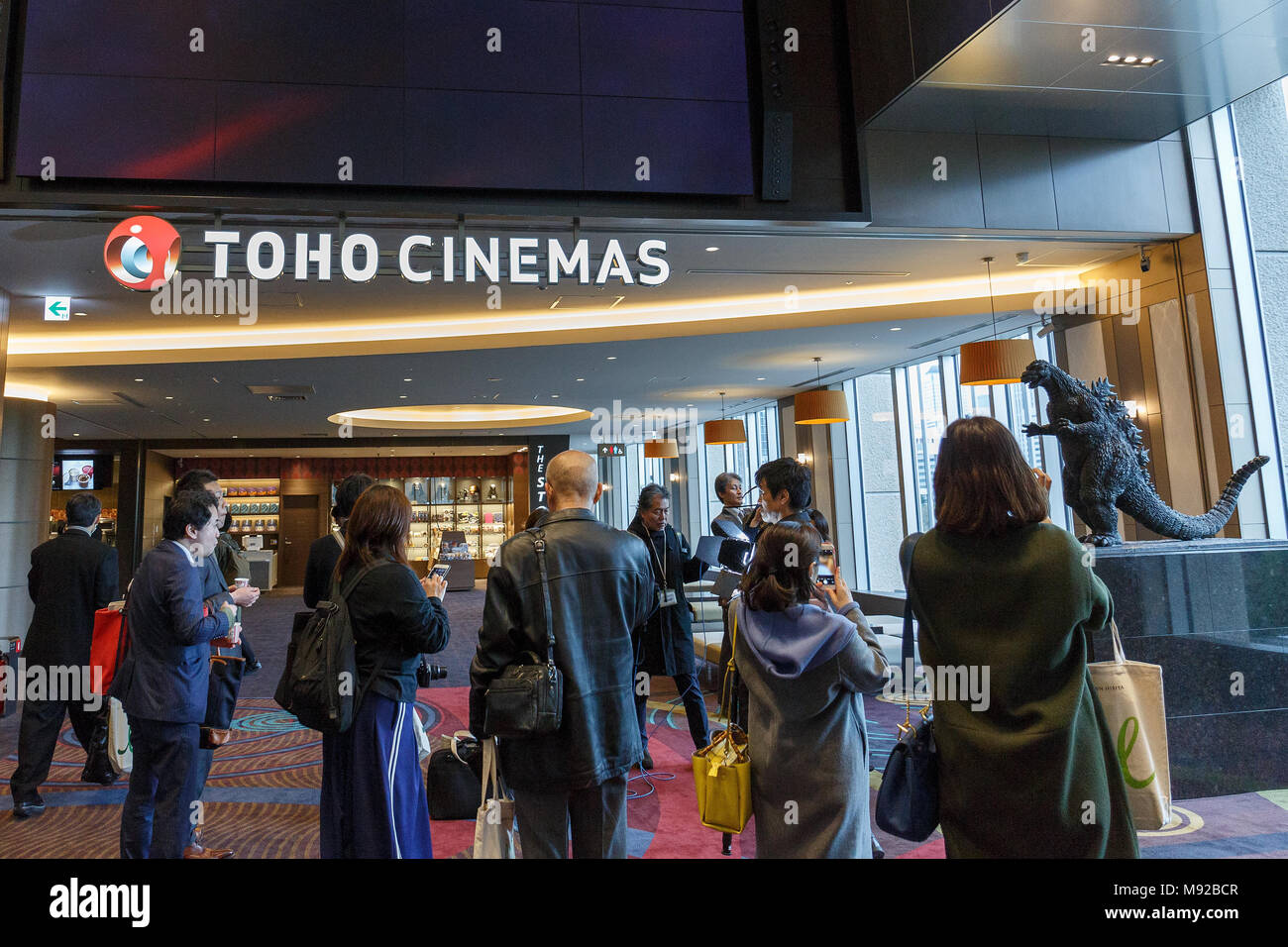 Members of the press gather at Toho Cinemas in Tokyo Midtown Hibiya ...