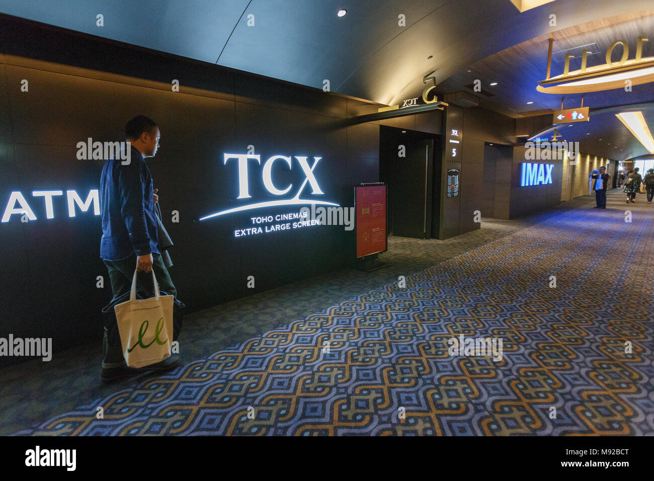 Members of the press gather at Toho Cinemas in Tokyo Midtown Hibiya ...