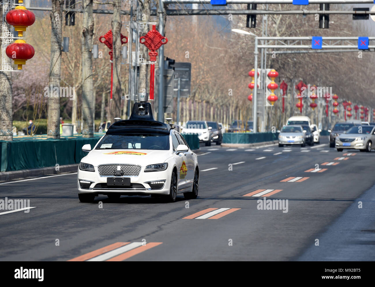 Beijing, China. 22nd Mar, 2018. A self-driving vehicle for public road ...