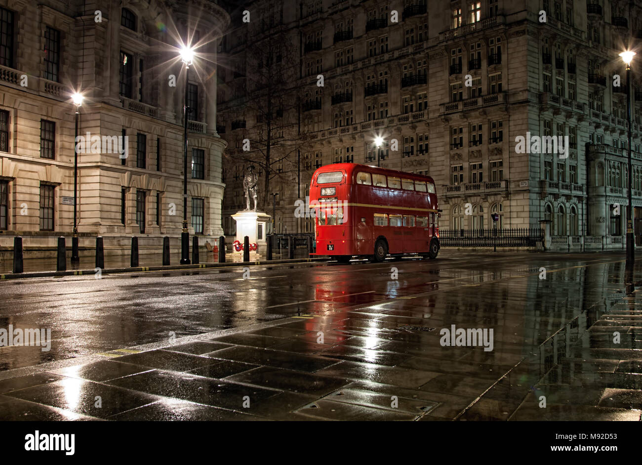 Red London Bus at night Stock Photo - Alamy