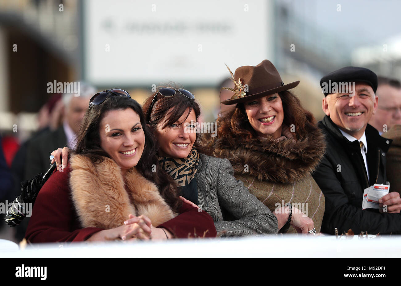 Female racegoers watch the action in the St. James's Place Foxhunter ...