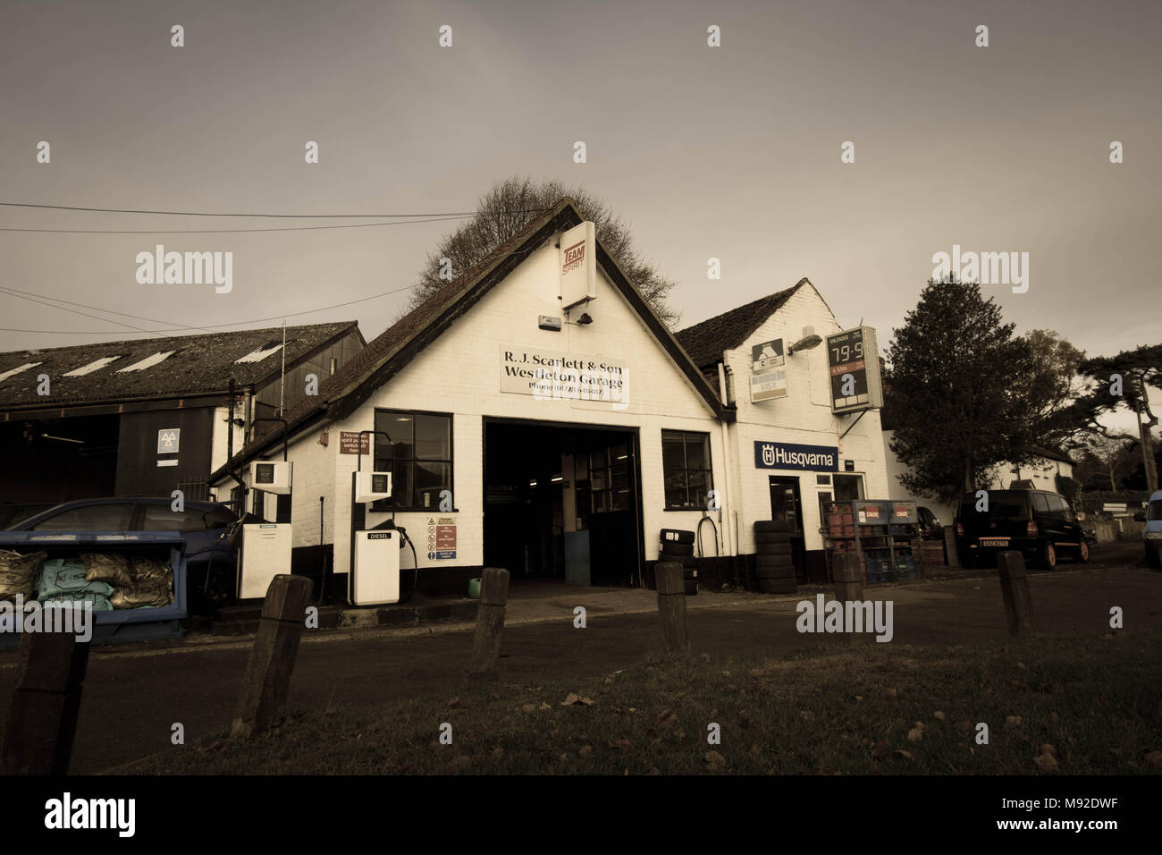Garage repairs repairing outside petrol petrol sign signs store store ...