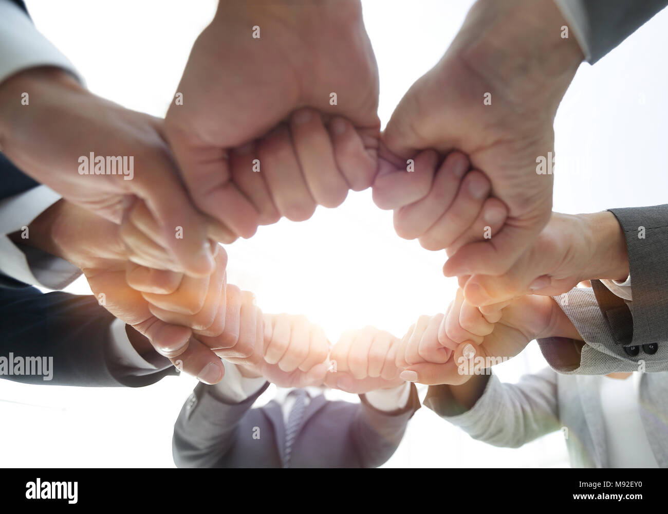 group of people joined their hands Stock Photo - Alamy