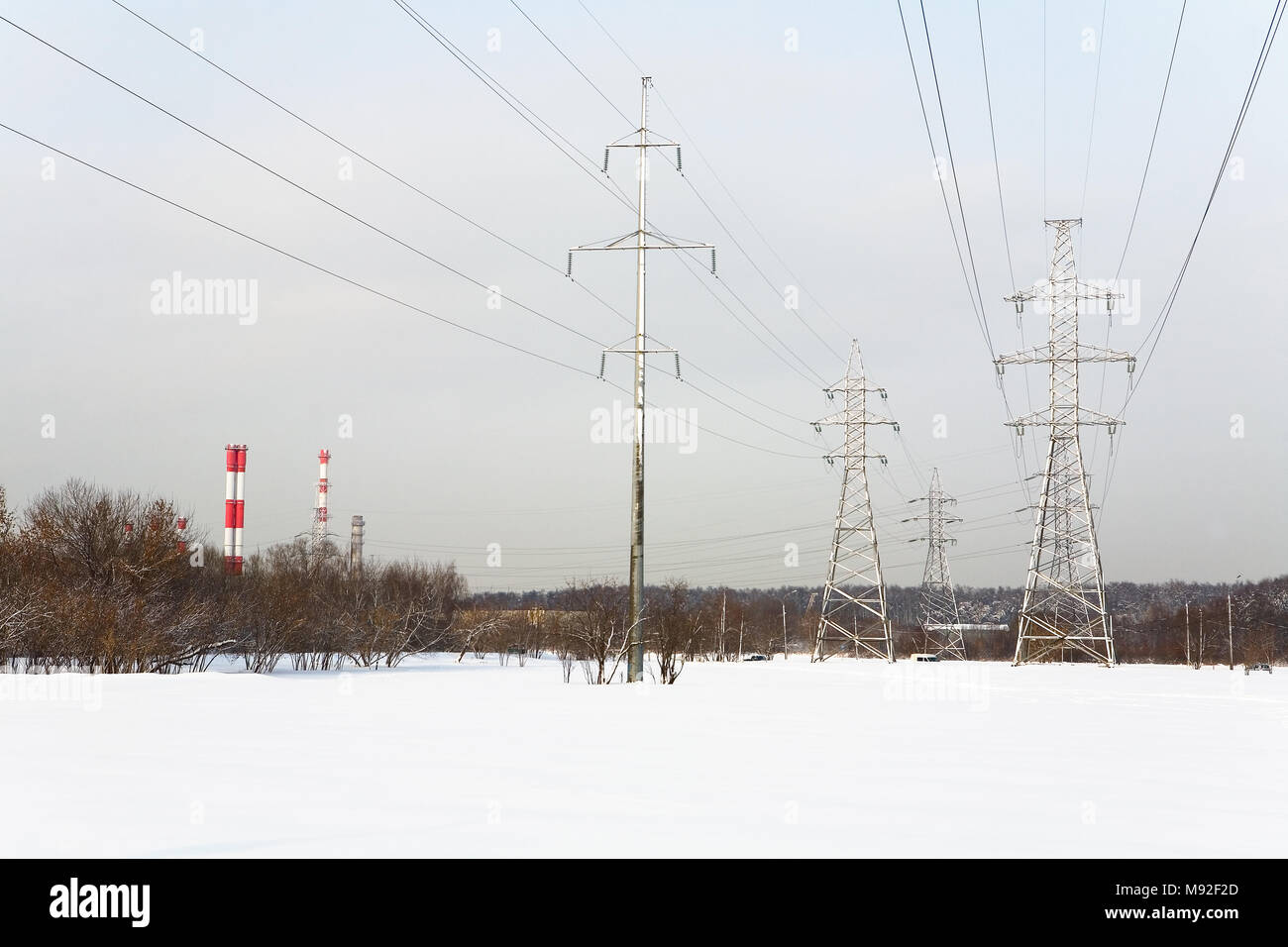High voltage power lines in winter. Russia Stock Photo - Alamy