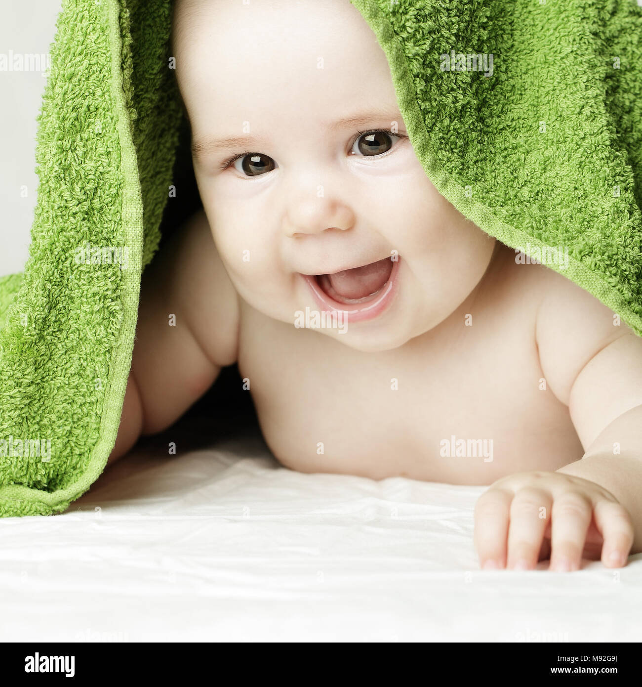 Cute baby, face closeup Stock Photo - Alamy
