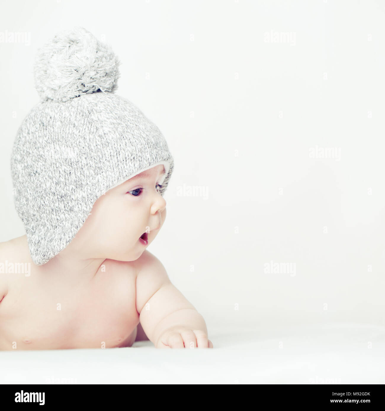 Cute curious baby - cognize the world Stock Photo - Alamy
