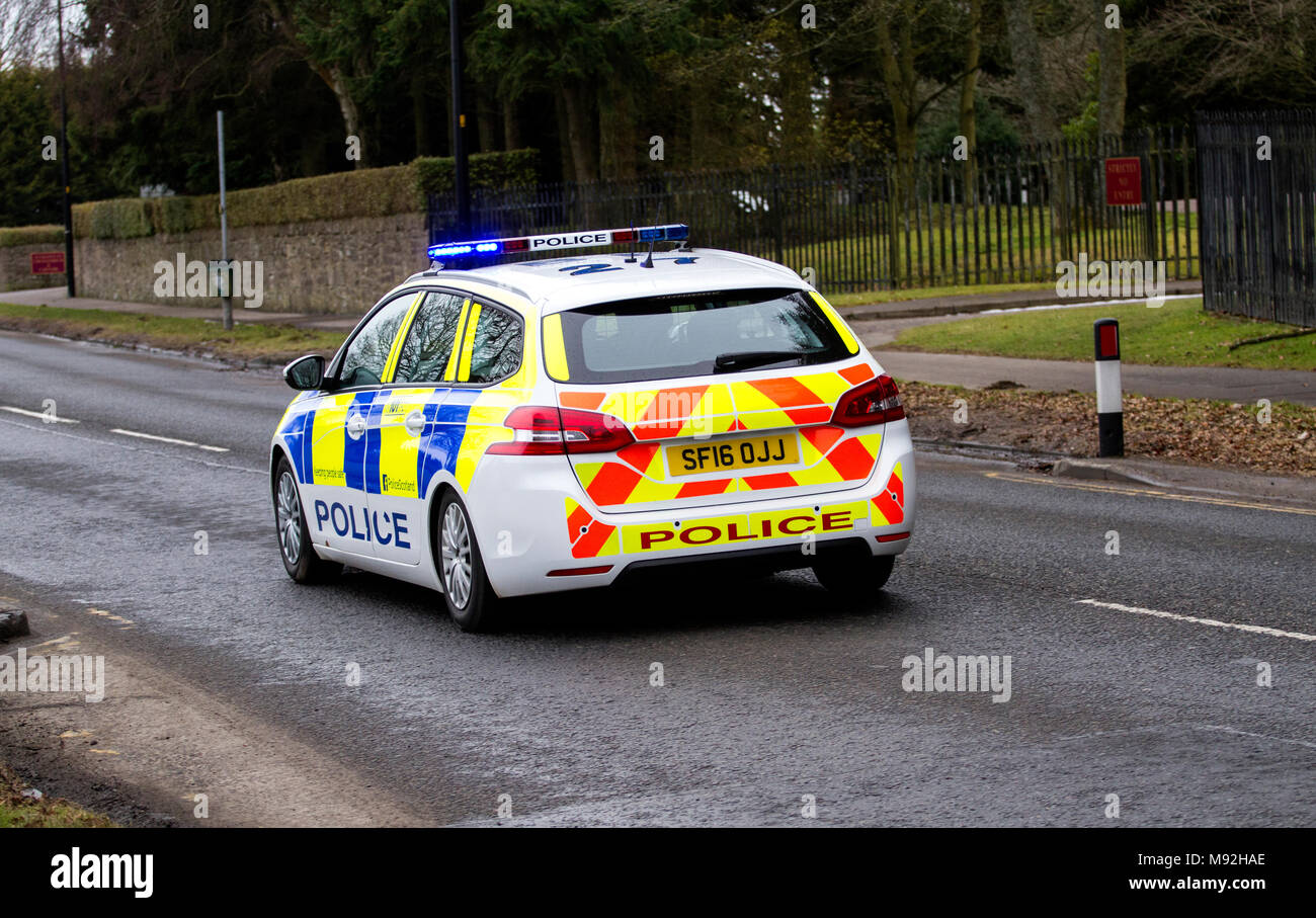 Responding to a 999 emergency call, a Police Scotland police car with ...