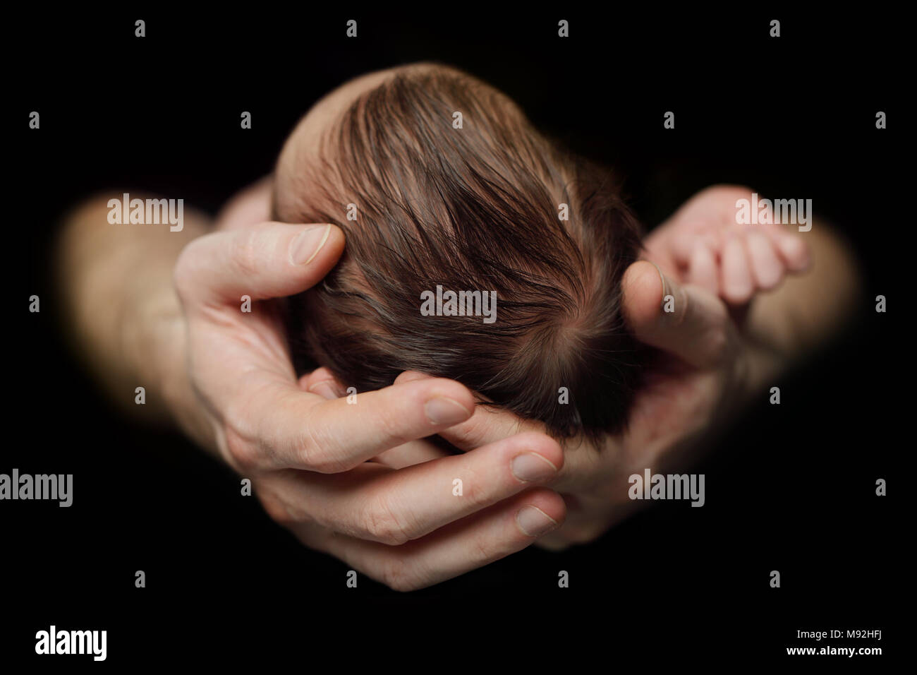 Baby in fathers hand hi-res stock photography and images - Alamy