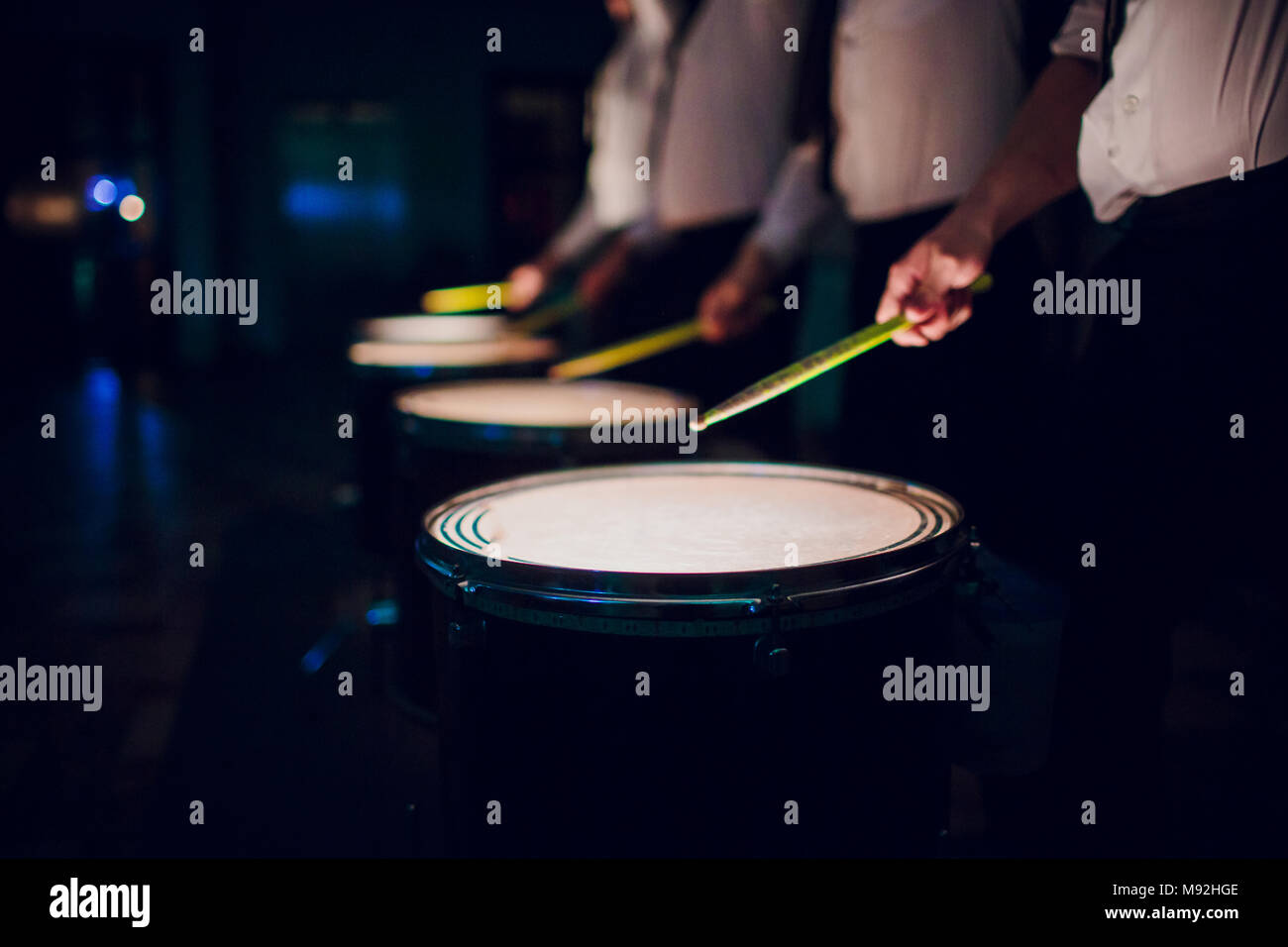 hands with drum sticks and drum man night Stock Photo - Alamy