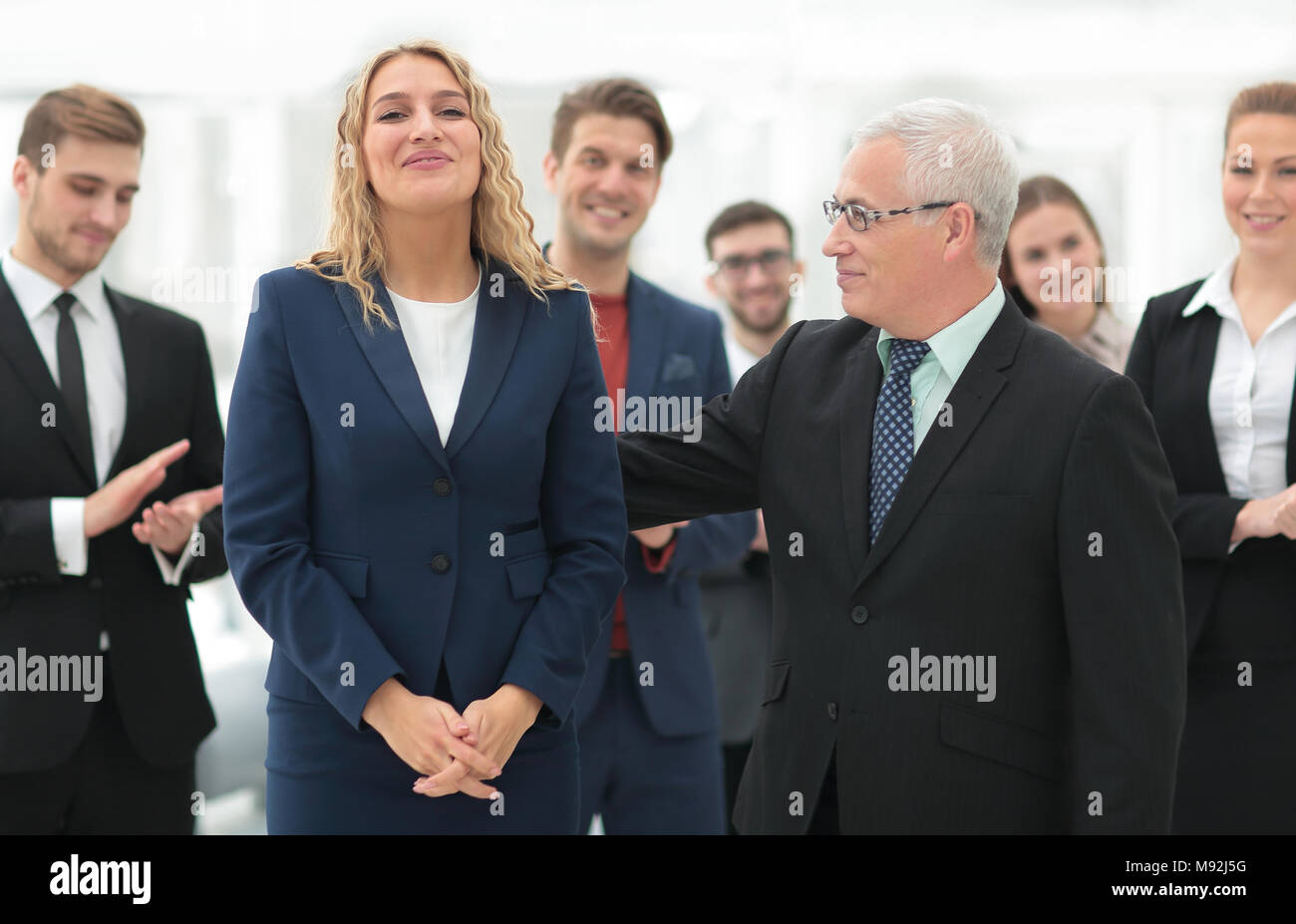 happy business woman and senior business partner on the business ...