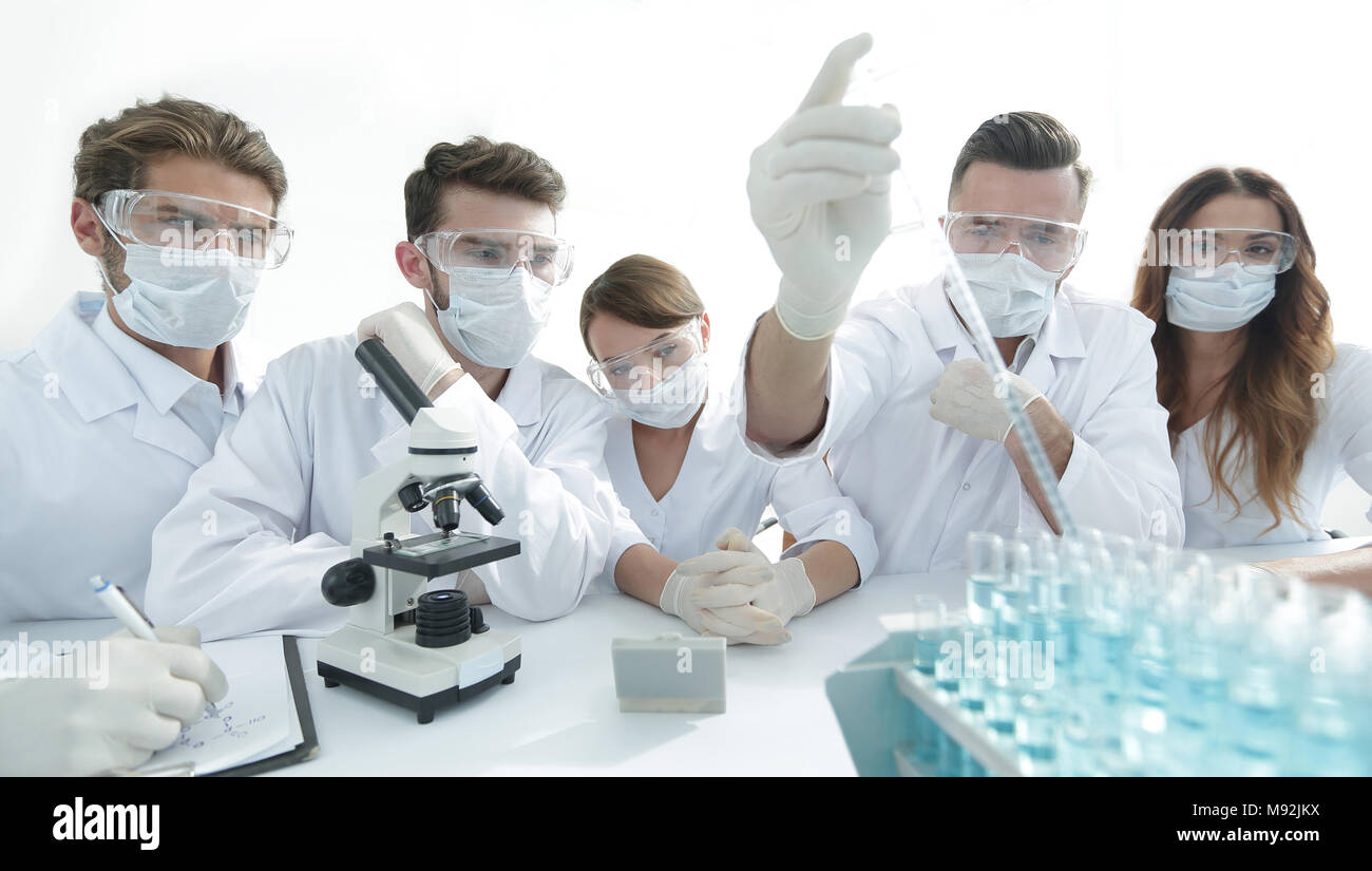 Scientists at chemical laboratory during work.photo with copy space ...
