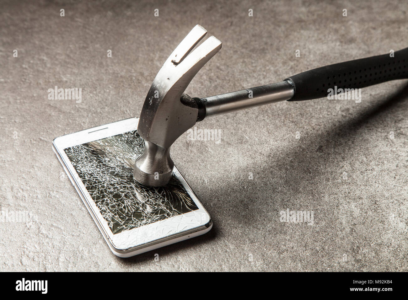 Smartphone with broken screen Stock Photo - Alamy