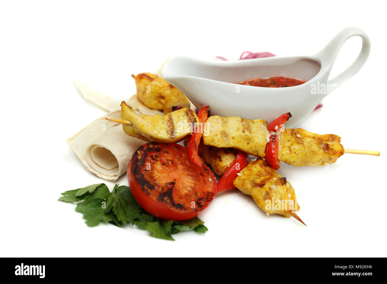 Barbecue sticks with chicken meat and vegetables Stock Photo - Alamy