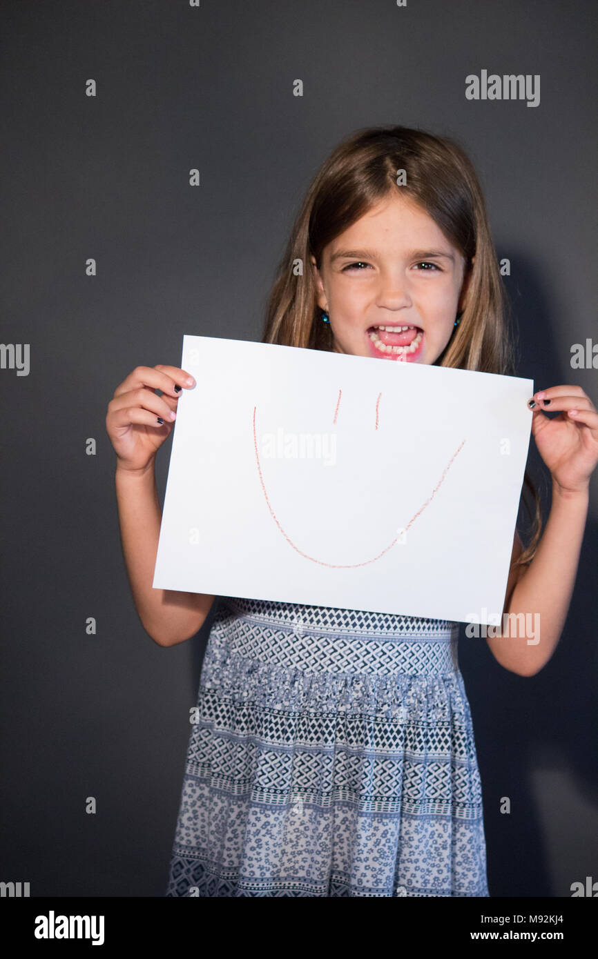 girl with paper Stock Photo - Alamy