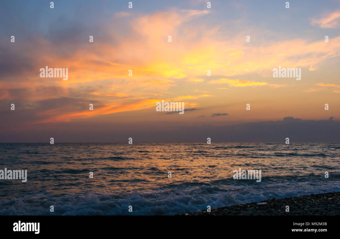 Amazing sea sunset, the sun, waves, clouds Stock Photo - Alamy