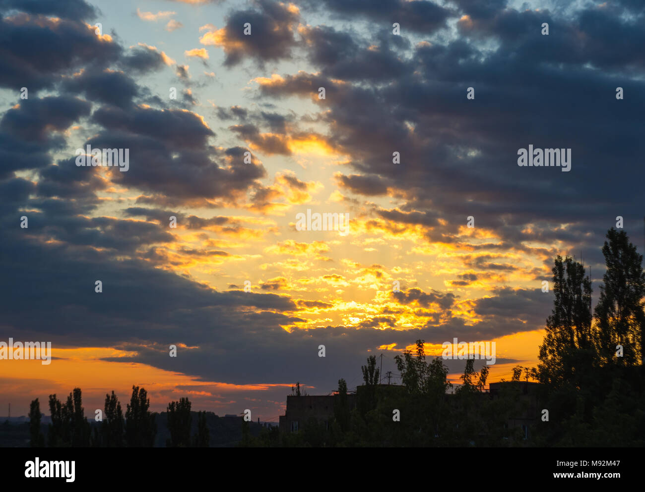 Landscape with dramatic light - beautiful golden sunset with saturated ...