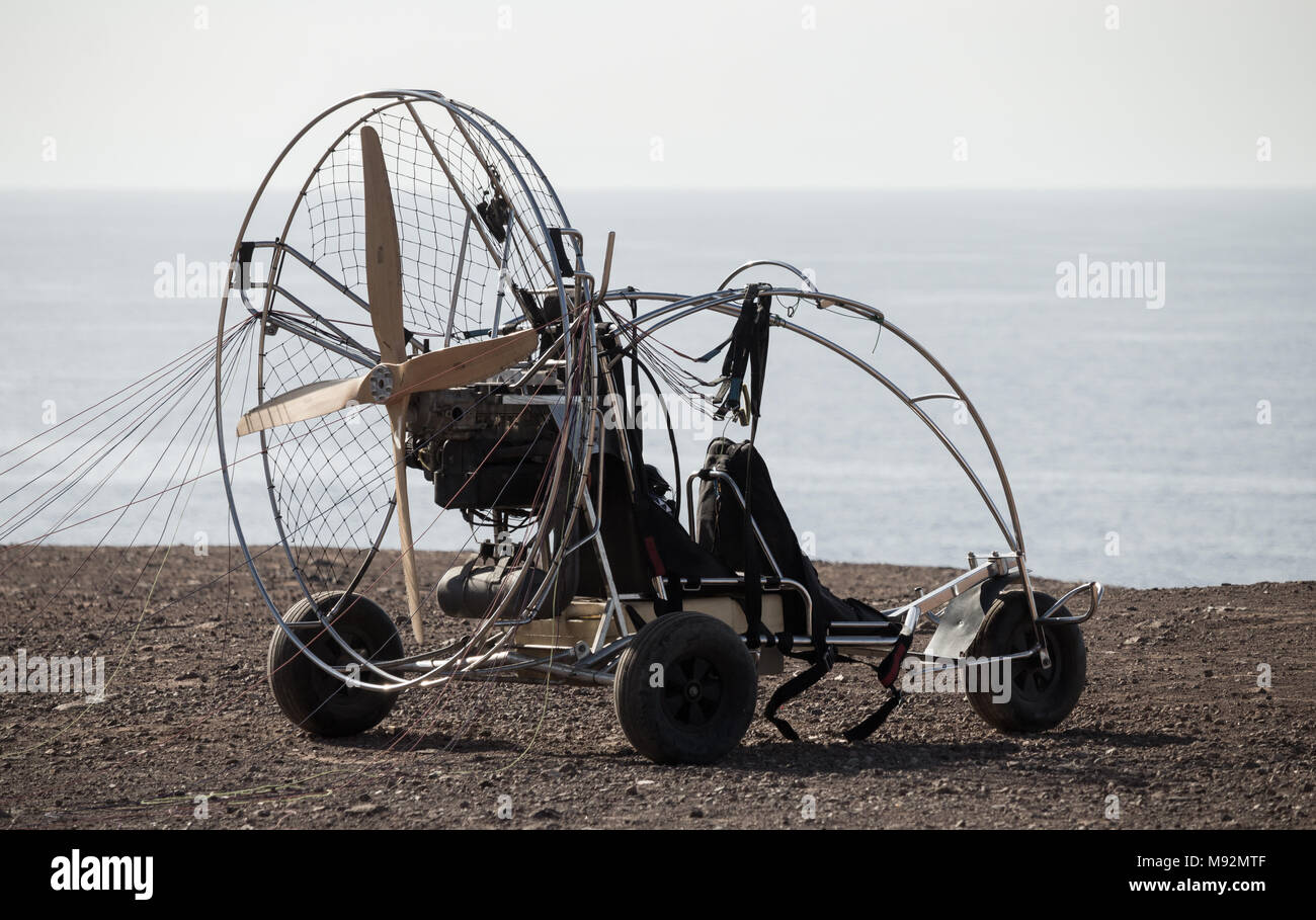 Paragliding: Motorized tandem paraglider preparing take off Stock Photo ...