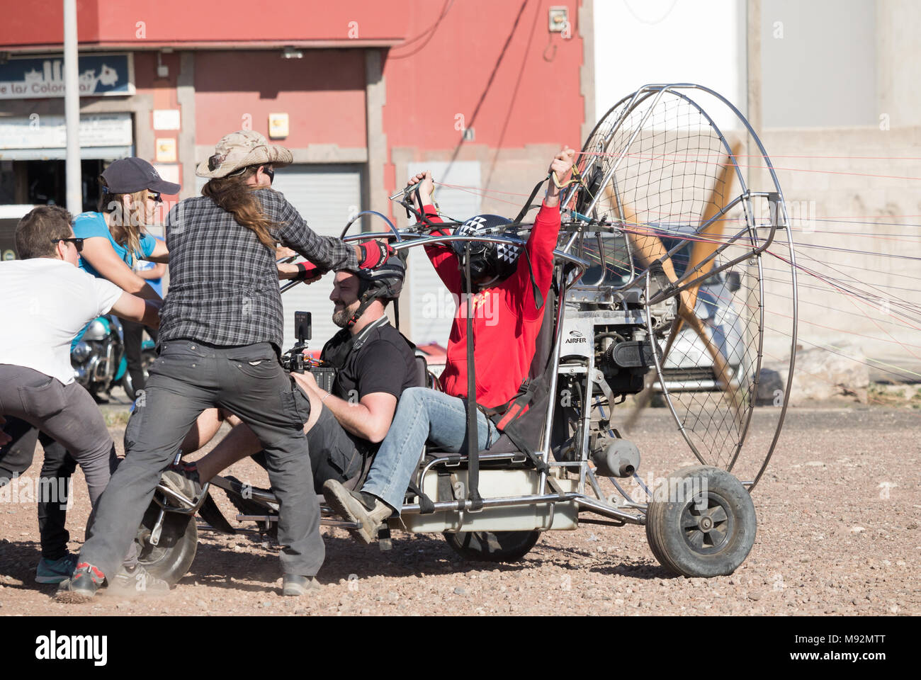 Motorized tandem paraglider preparing take off Stock Photo - Alamy