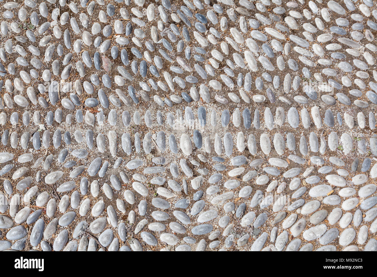 Surface of Pedestrian road of from pebbles in the Greek fortress of ...