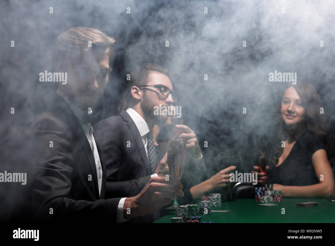 Happy and rich people celebrating their win after successful game Stock ...