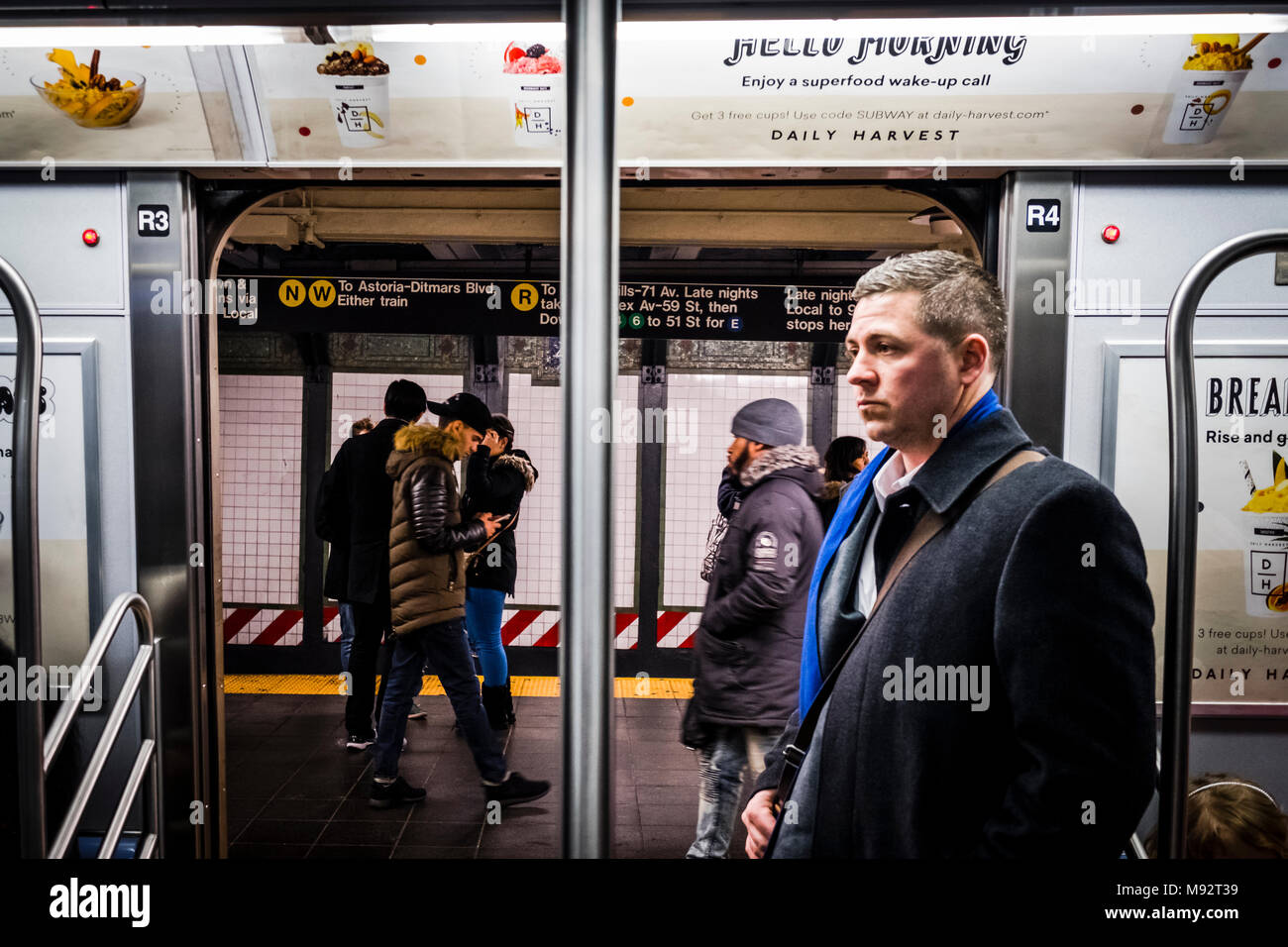 Commuters in subway wagon at New York subway system Stock Photo - Alamy