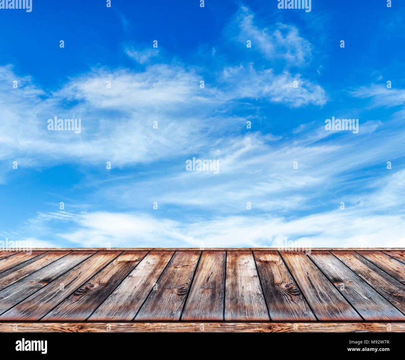 Wooden bench platform timber with sky Stock Photo - Alamy