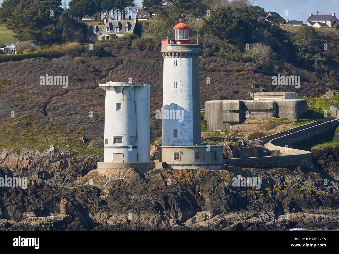 Lighthouse Buildings situated on a point on a Rocky outcrop, overlooked ...