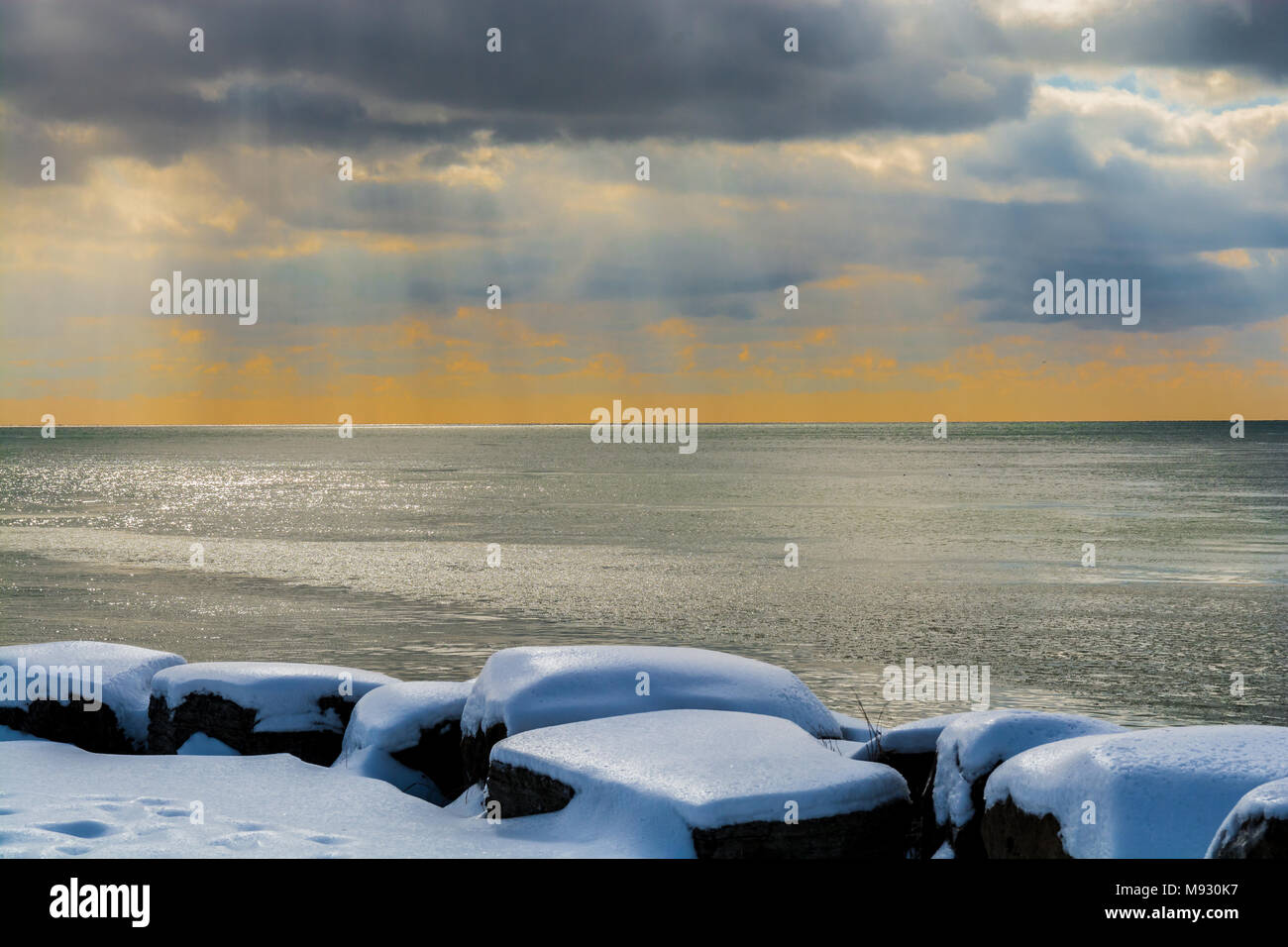 Winter Landscape Scene showing white snow along icy water lake coastal ...