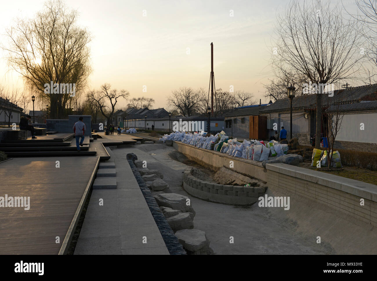 Hard landscaping of stream and path nears completion near Houhai in ...