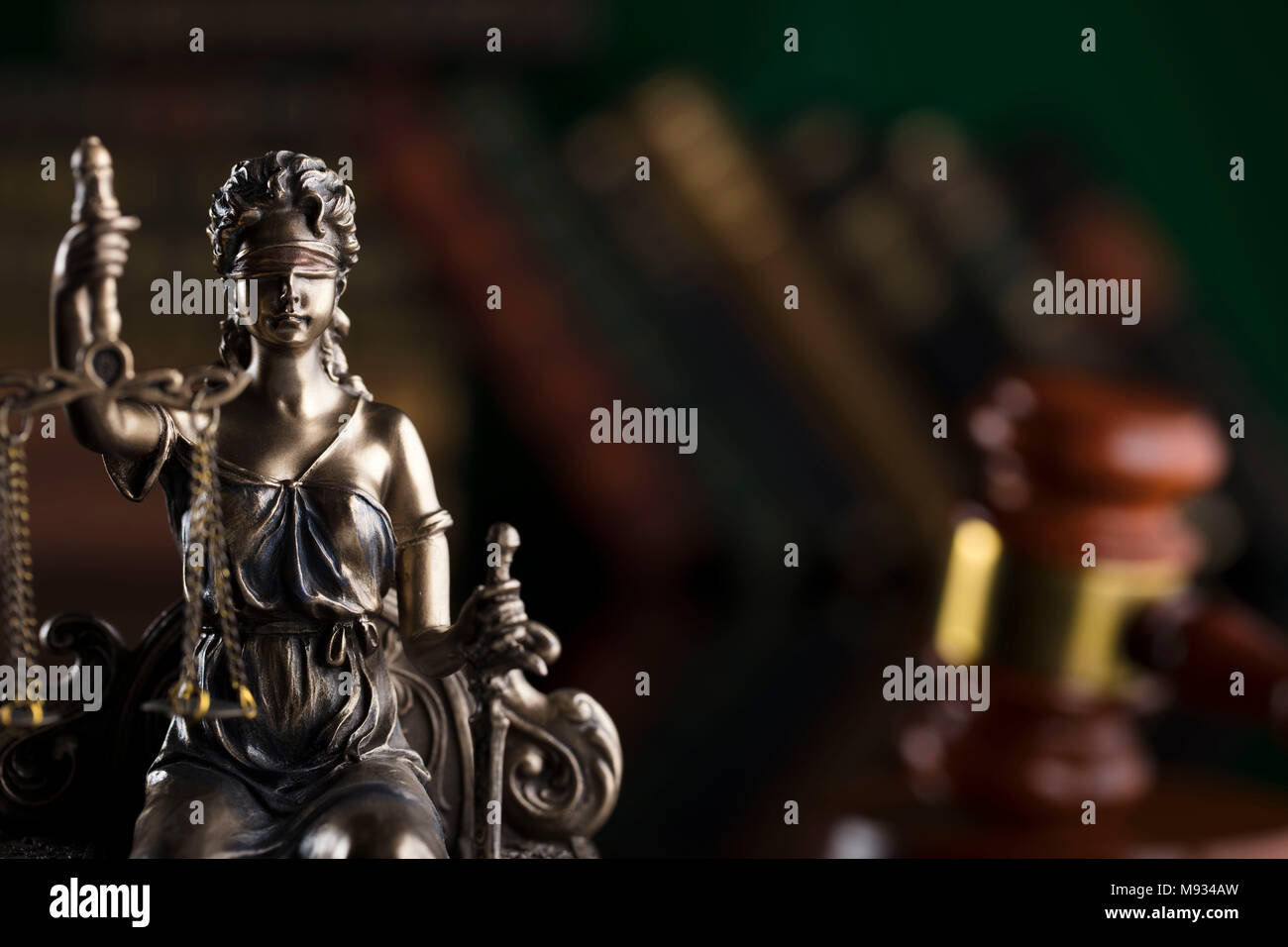Lady justice on brown background Stock Photo - Alamy